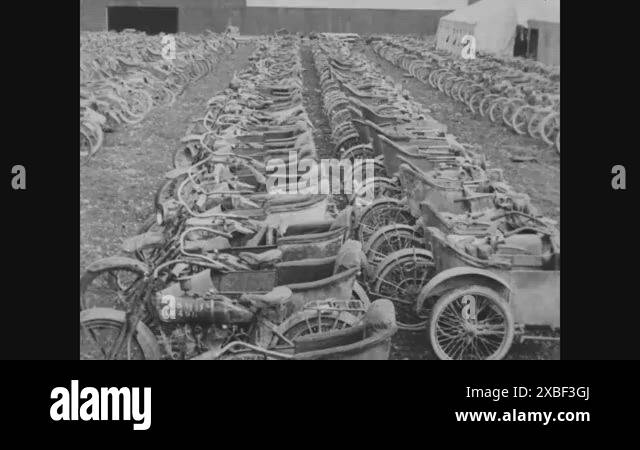 1918 - German POWs sort the parts of salvaged motorcycles for the US ...