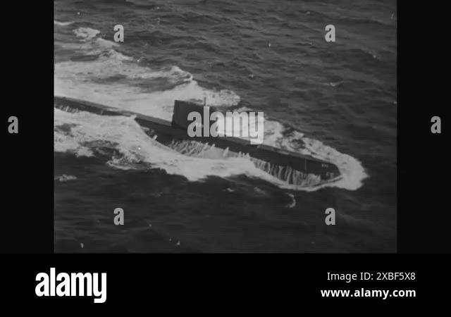 1950s - The US Navy's Nautilus submarine is seen surfacing. USAF planes ...