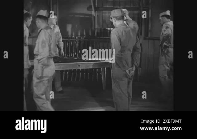 1943 - A US Army corporal shows soldiers a Japanese rifle captured in ...