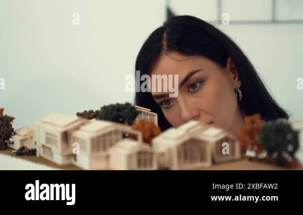 Close up of caucasian skilled architect engineer focus on checking ...