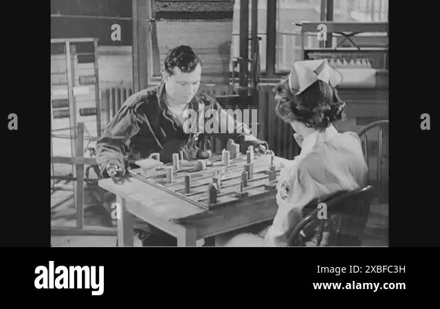 1944 - American soldier Harold Russell relearns how to play checkers ...