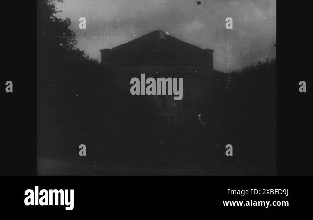 1940 - Huge crowds of adults and children salute Hitler as he passes ...