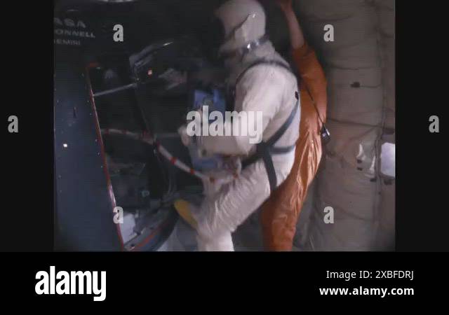 1966 - NASA Astronaut Dave Scott undergoes zero gravity egress and ...