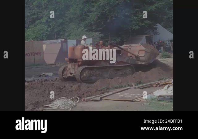 1968 - A bulldozer levels ground at Resurrection City, the Poor People ...