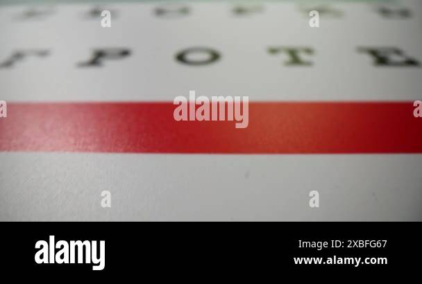 Letters of different sizes on Snellen chart in modern hospital. Patient ...