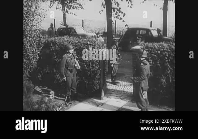 1940s - A Nazi government official meets with several military officers ...