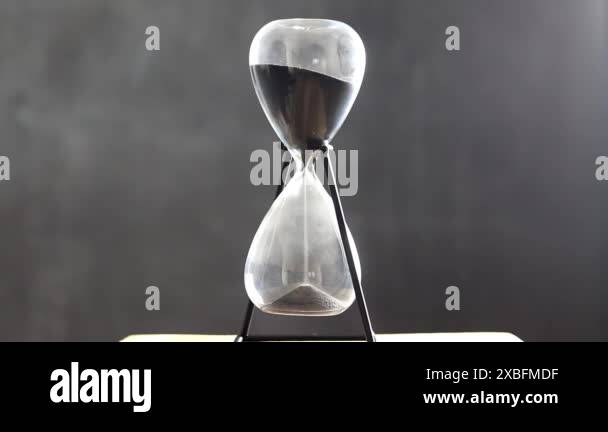 Antique vintage hourglass with black background. Wooden retro Hourglass ...