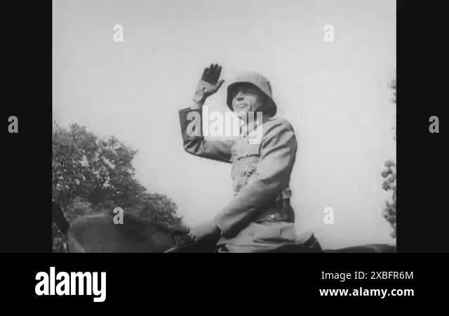 Nazi soldiers march through Paris and set up Nazi flags during the ...