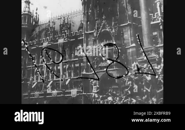 Hitler and Mussolini address a large crowd of people in Paris during ...