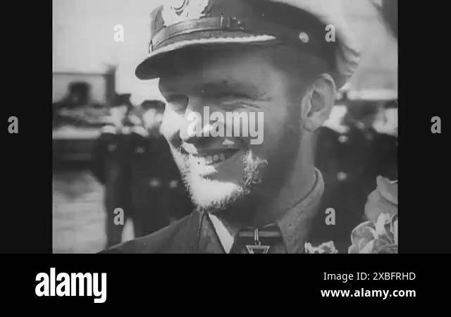 A man gives a speech in front of German commanders during World War 2 ...