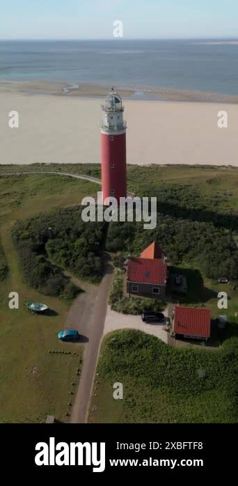 Texel lighthouse in the Netherlands, Dutch Island Texel with sand dunes ...