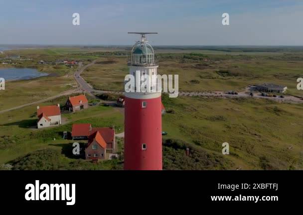 Texel lighthouse during sunset Netherlands Dutch Island Texel in summer ...