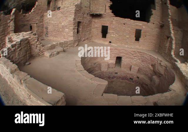 Pan-right of a circular structure amid the ruins of Native American ...