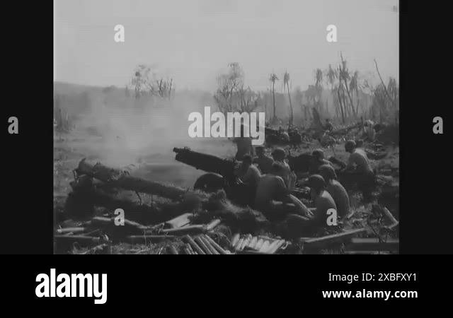 1944 - Troops fire and transport artillery during the Invasion of Guam ...