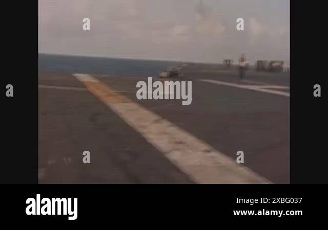 1961 - Pilot's-eye-view footage shows the catapult crew on the USS ...
