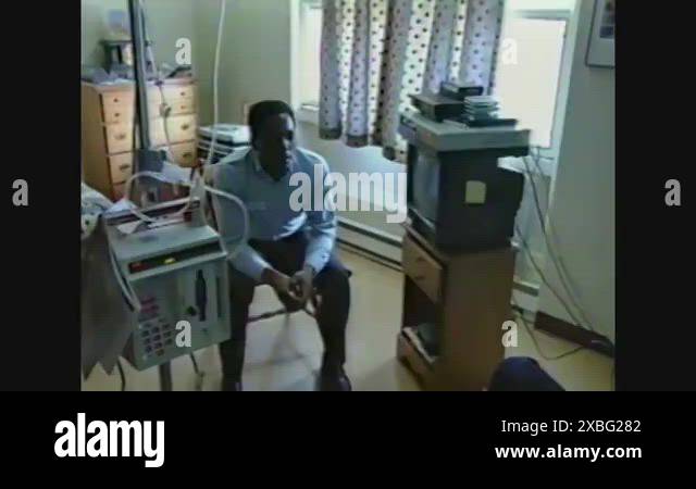 1992 - Magic Johnson talks to a man about his treatment at a recovery ...