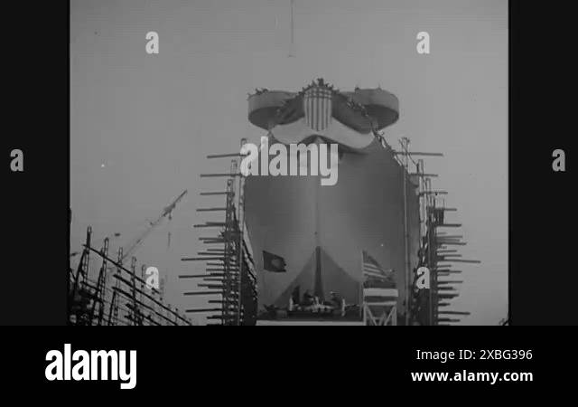 1943 - Crowds wave to the camera when the USS George Washington Carver ...