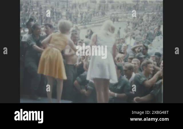 1969 - Miss America contestants shake hands with and sign autographs ...