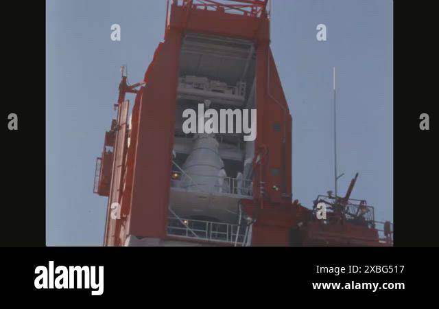 1966 - The head of the Gemini IX is placed at the top of the launch ...