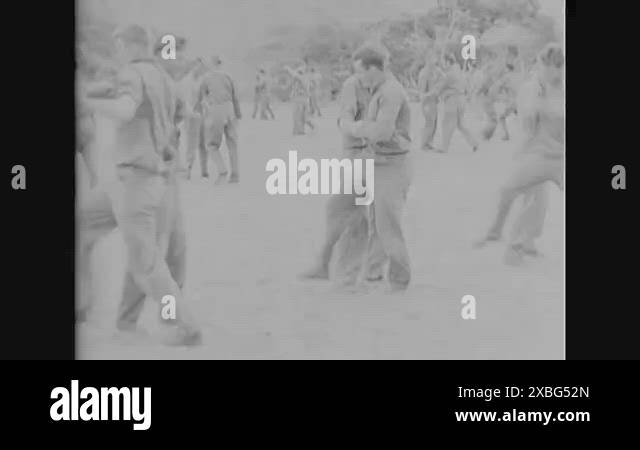Soldiers train judo and men practice firing M-1 Garand rifle from hip ...