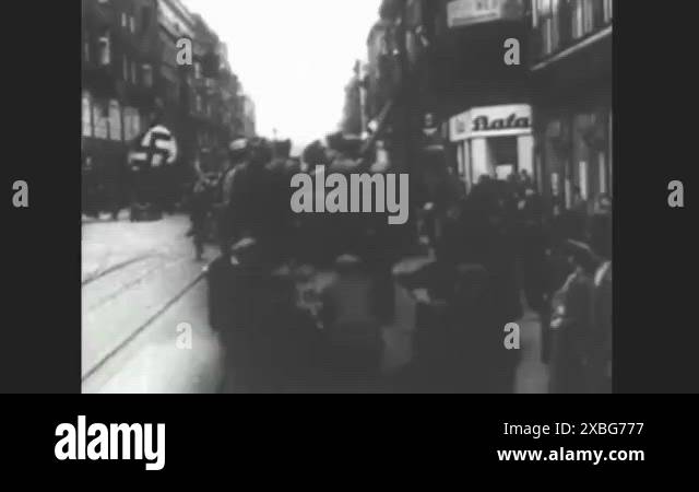 1933 - Nazis drive through busy city streets in Germany, urging ...