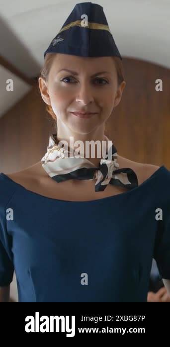 Stewardess applause to camera inside of private business jet cabin ...