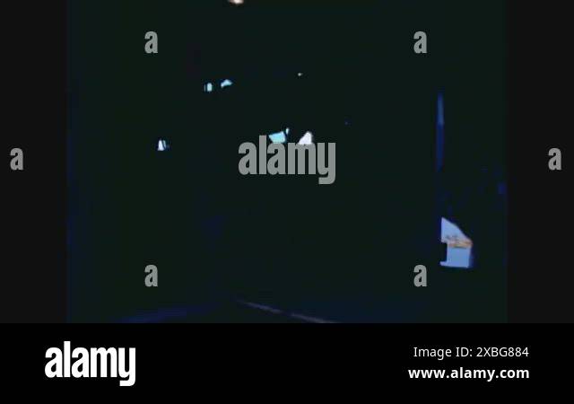 Wounded patients are transferred from an ambulance bus to a military ...