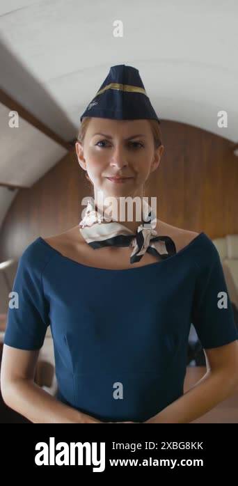 Airplane hostess applause to camera inside of private business jet ...
