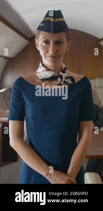 Slow motion of cabin hostess applause to camera inside of private ...