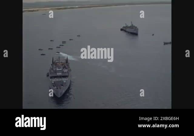 1965 - A convoy of US Navy vessels sails outside Chu Lai Stock Video ...