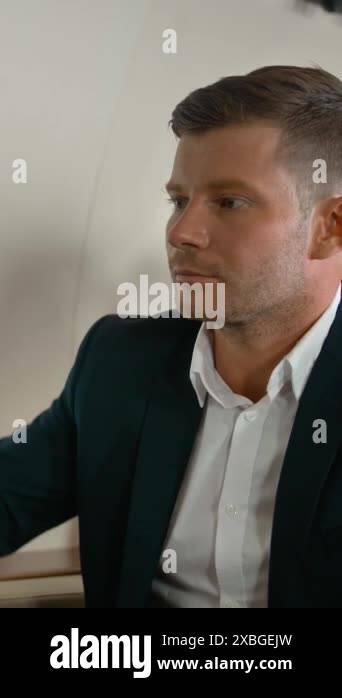 Attractive entrepreneur preparing his air seat in private jet plane. He ...