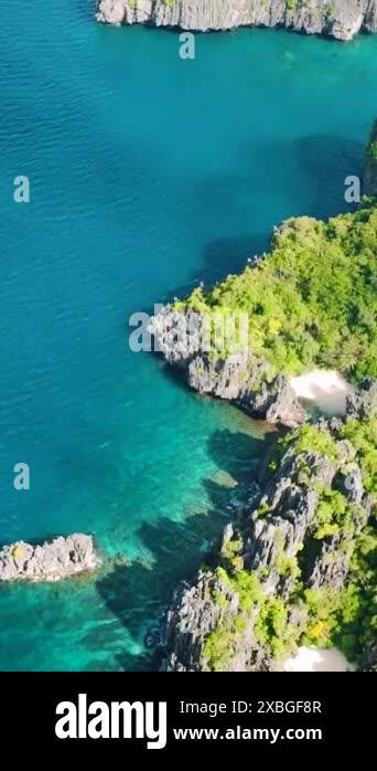 Group of boats in Twin Rocks and Lagoons in Miniloc Island. El Nido ...