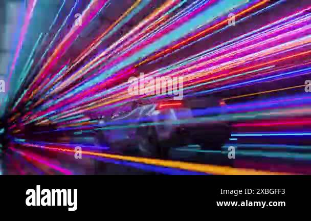 Sleek sports car moving at high speed through a vibrant neon tunnel ...