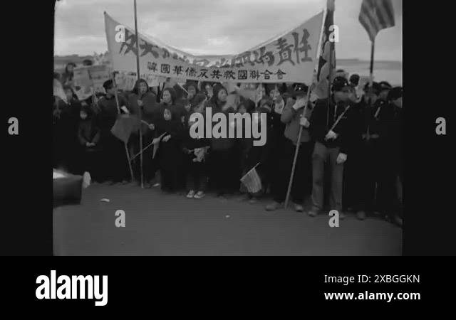 1954 - South Korean children sing and wave flags as repatriated Chinese ...