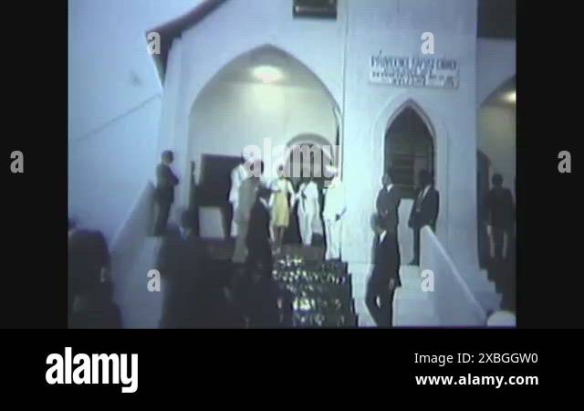 1972 - Pat Nixon and President Tolbert are escorted from a church ...