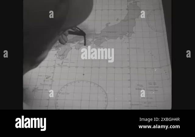 1945 - US Navy officers mark up a map of Japan Stock Video Footage - Alamy