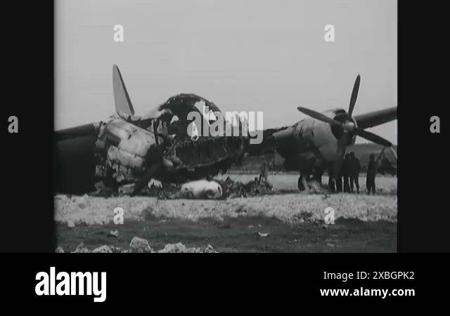1945 - Wrecked American planes and dead Japanese pilots are seen on the ...