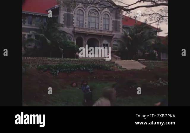 1942 - Children return to a building after a practice air raid drill ...