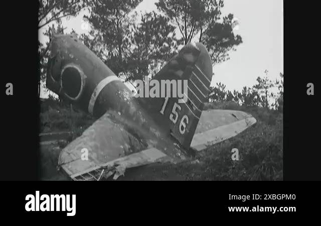 1945 - Wrecked American planes and dead Japanese pilots are seen on the ...