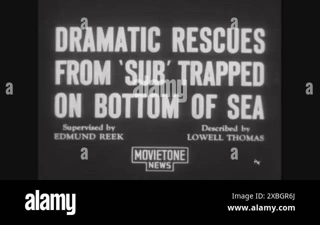 1939 - From the deck of the USS Falcon, a diver is lowered into the sea ...