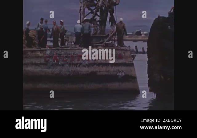 1942 - The damaged USS California and other battleships in Pearl ...