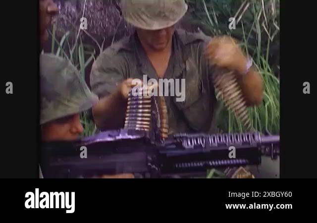 1965 - US Army machine gunners capture a Viet Cong soldier Stock Video ...