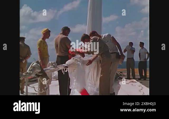 1960 - US Navy sailors work on an anchor balloon Stock Video Footage ...