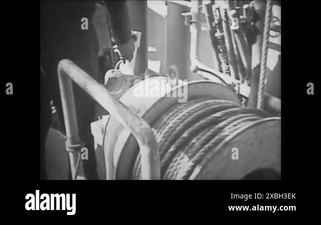 1960s - Blow-out preventers are lowered underwater at a marine well oil ... 1960s - Blow-out preventers are lowered underwater at a marine well oil ...