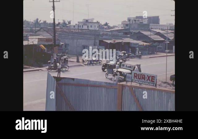 1973 - A high-angled view shows official cars entering an American ...
