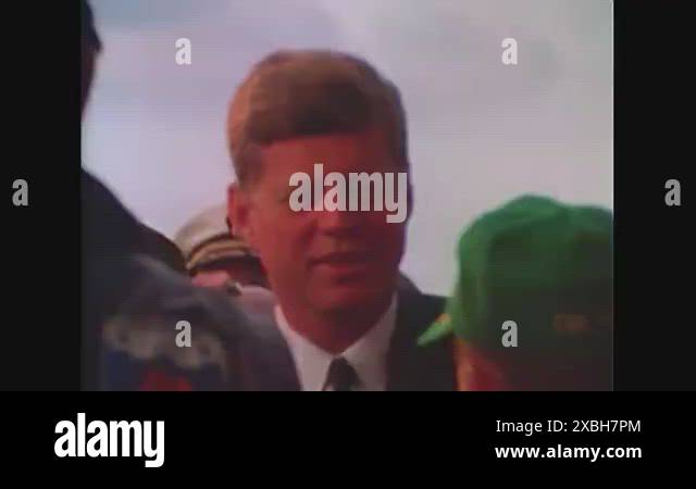 1963 - JFK shakes hands with personnel on the deck of the USS Kitty ...