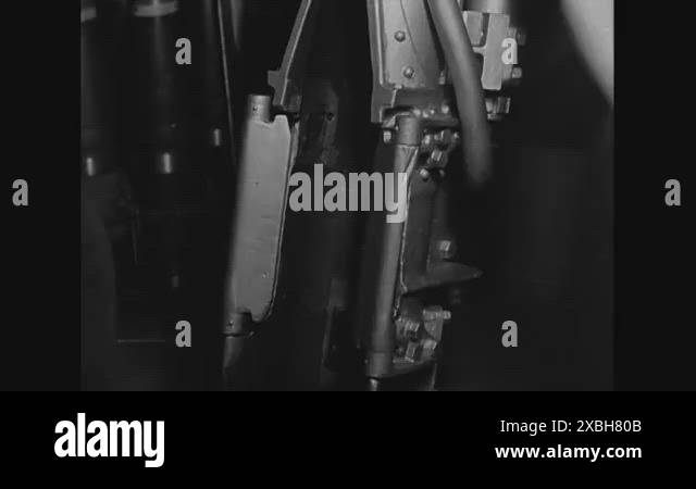 1942 - Shells are loaded on the USS Chicago. The shell hoist operator ...