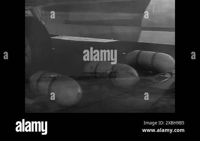 A Northrop YB-49 jet-powered heavy bomber is shown in flight as well as ...