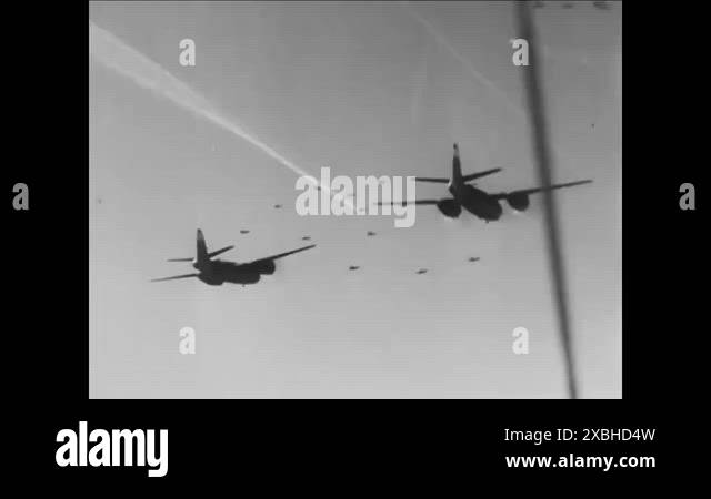Allied fighters and bombers strafe an aircraft and bomb German ...