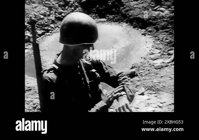 Colonel Lloyd L. Burke distinguishes himself in combat and receives the ...